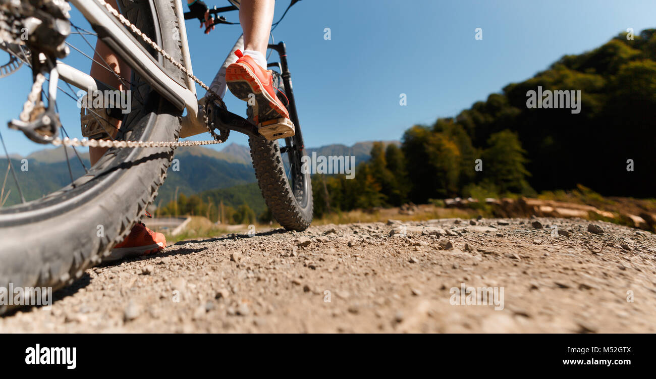 Photo bottom of woman on bicycle Stock Photo - Alamy
