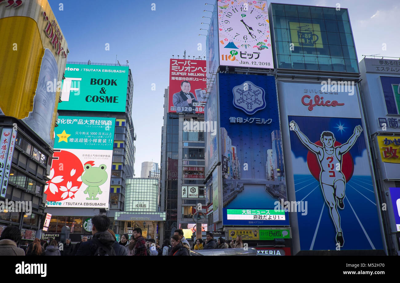 image of a runner crossing a finishing line, Dōtonbori area at the ...