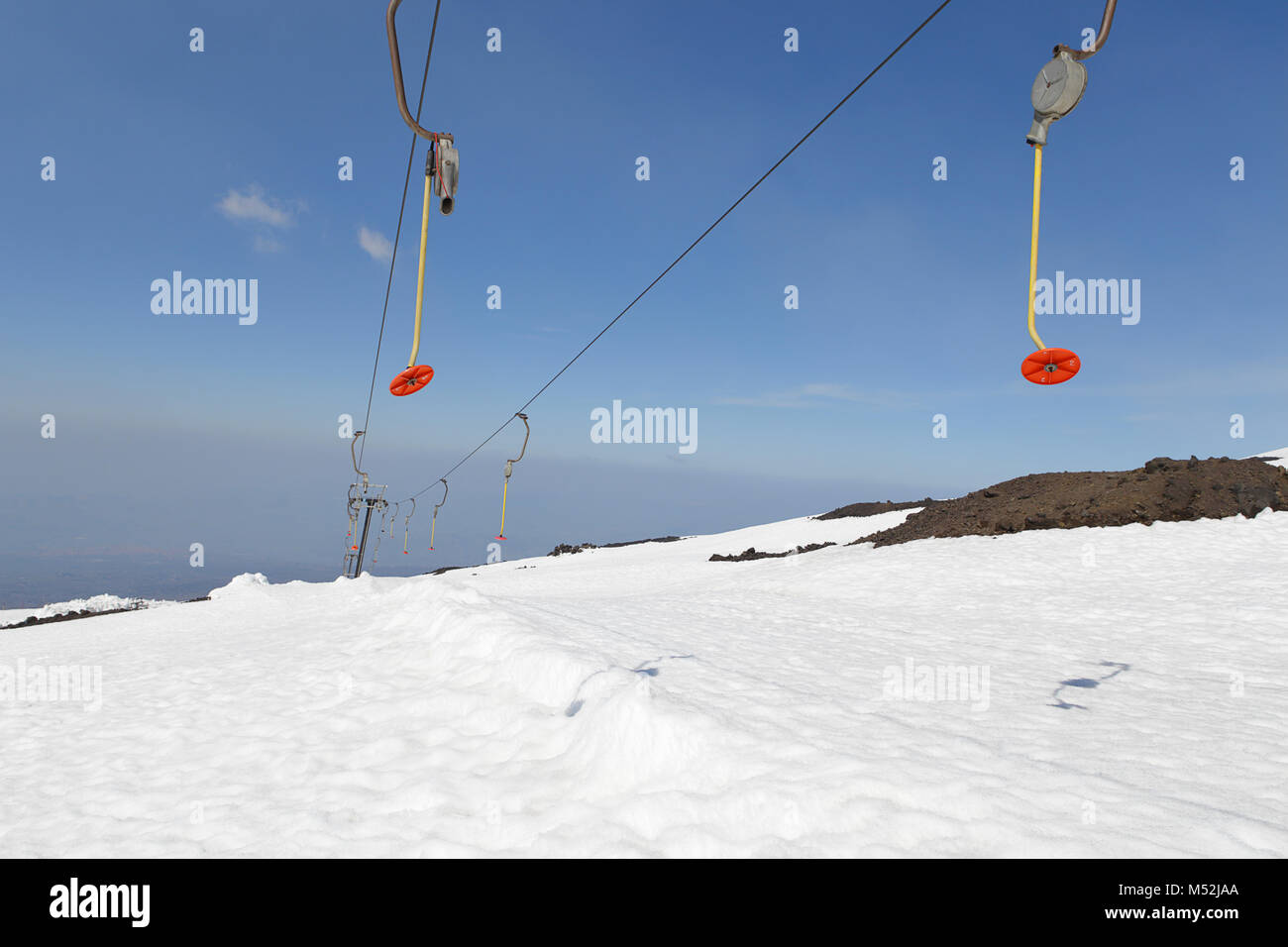 Alpine ski lift at Etna ski resort. Sicily, Italy Stock Photo - Alamy