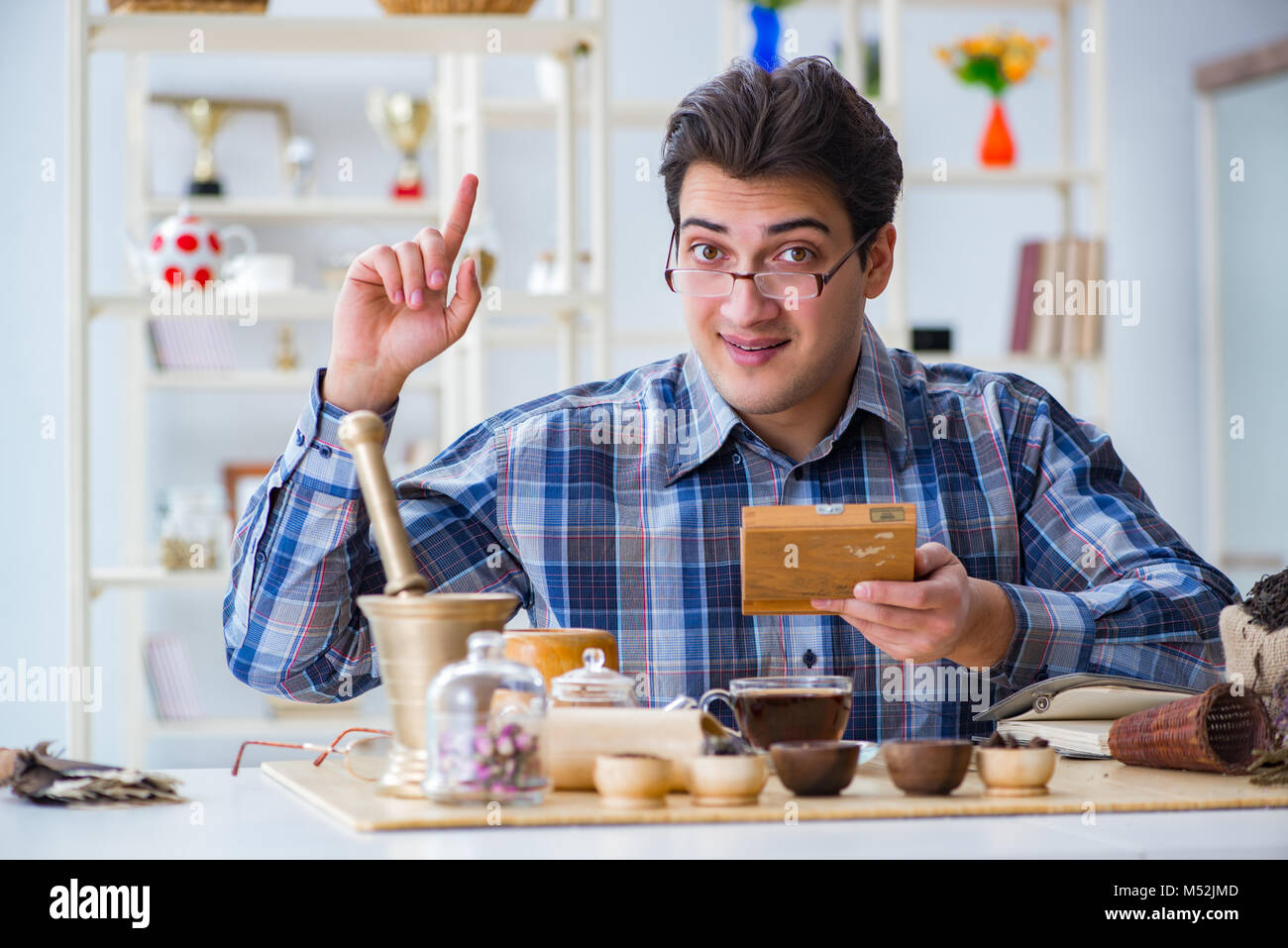 Professional tea expert trying new brews Stock Photo - Alamy