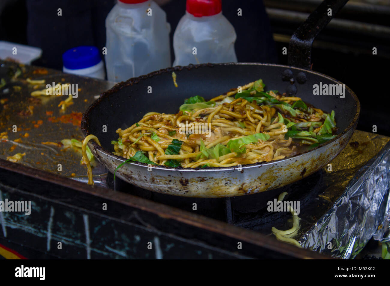 Asian pasta at a street food stall Stock Photo - Alamy