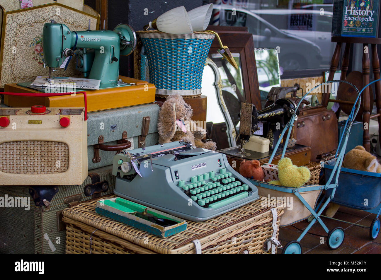 Vintage objects for sale at street market antiques shop Stock Photo - Alamy