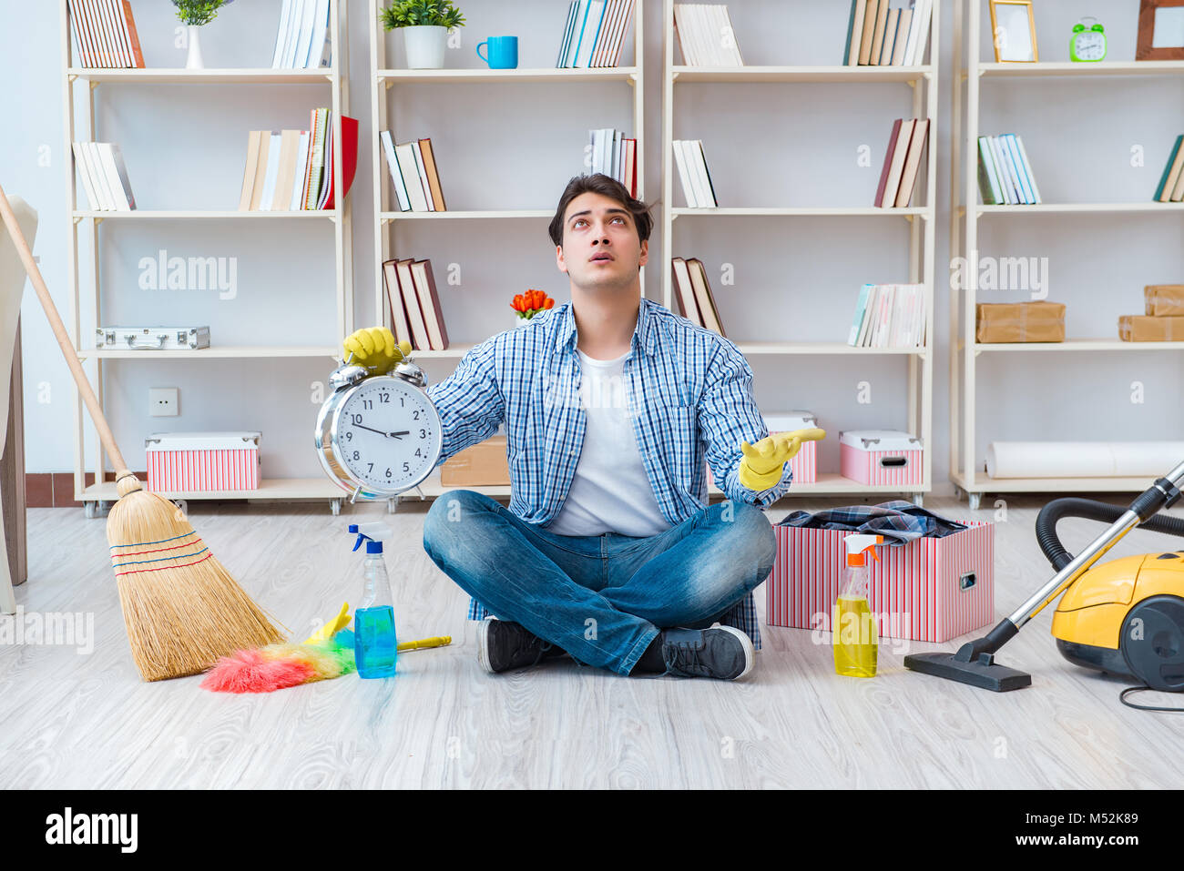 Man doing cleaning at home Stock Photo - Alamy