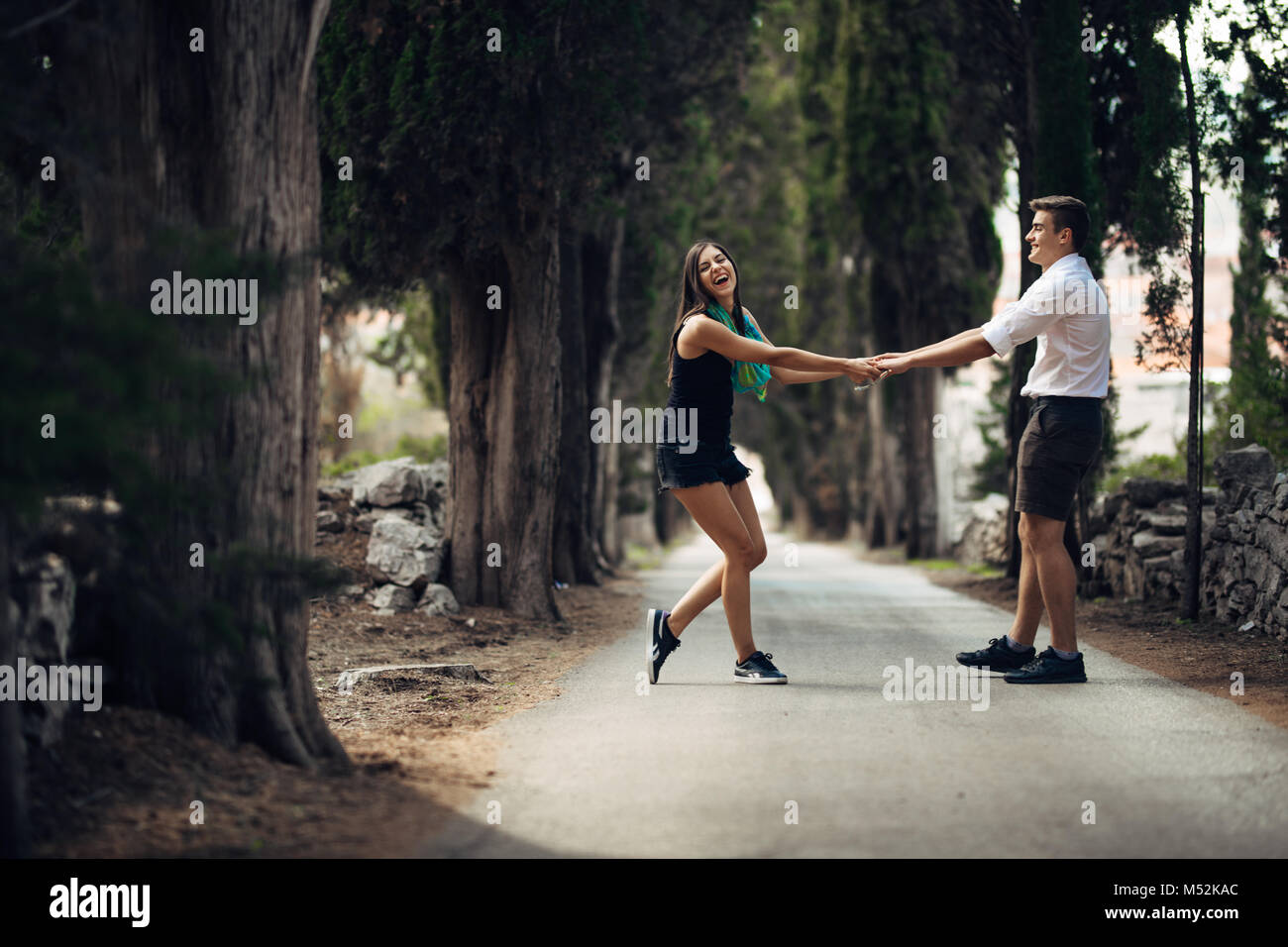 Romantic couple dancing on the street.Having a romantic date ...