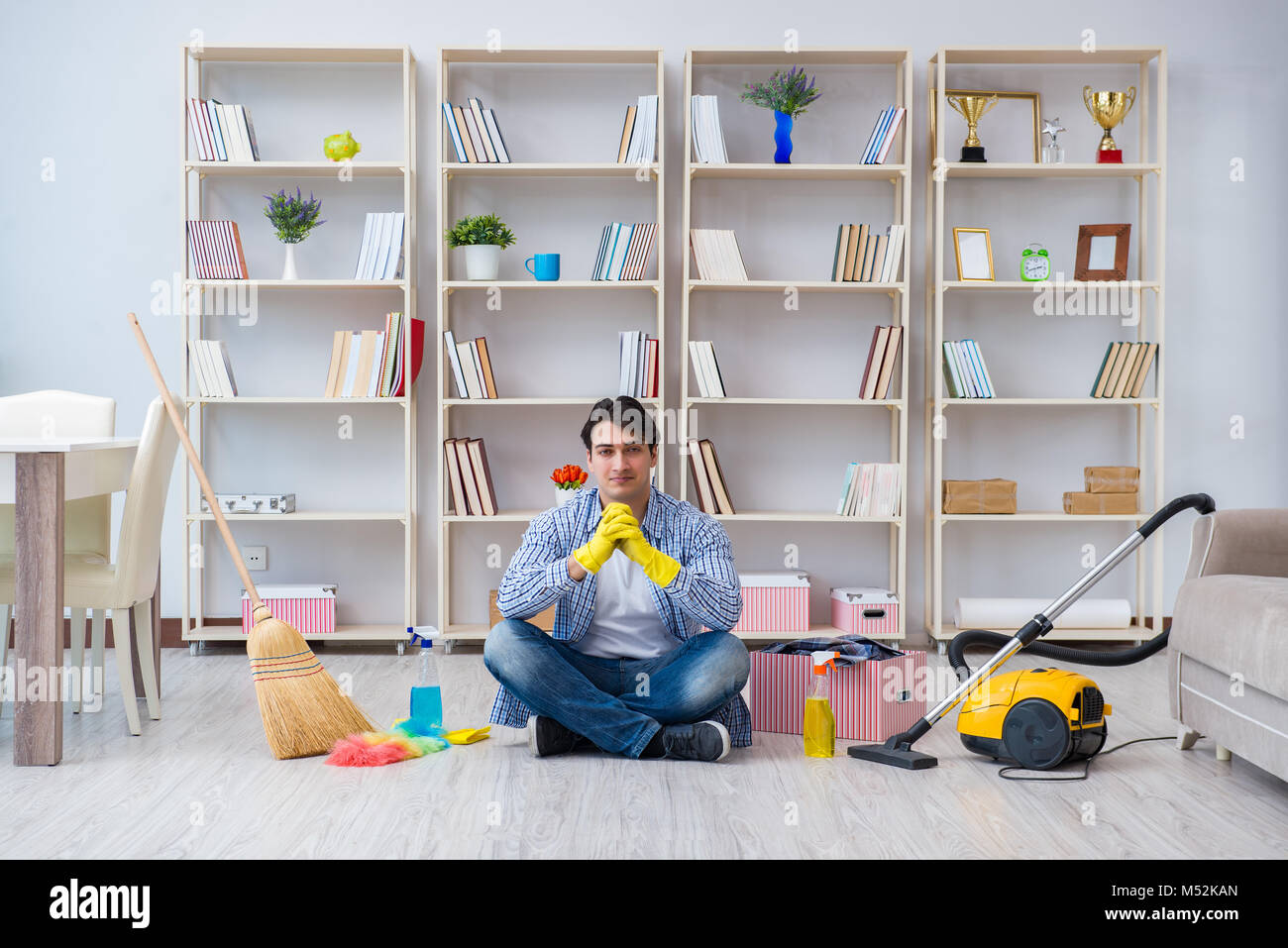 Man doing cleaning at home Stock Photo - Alamy