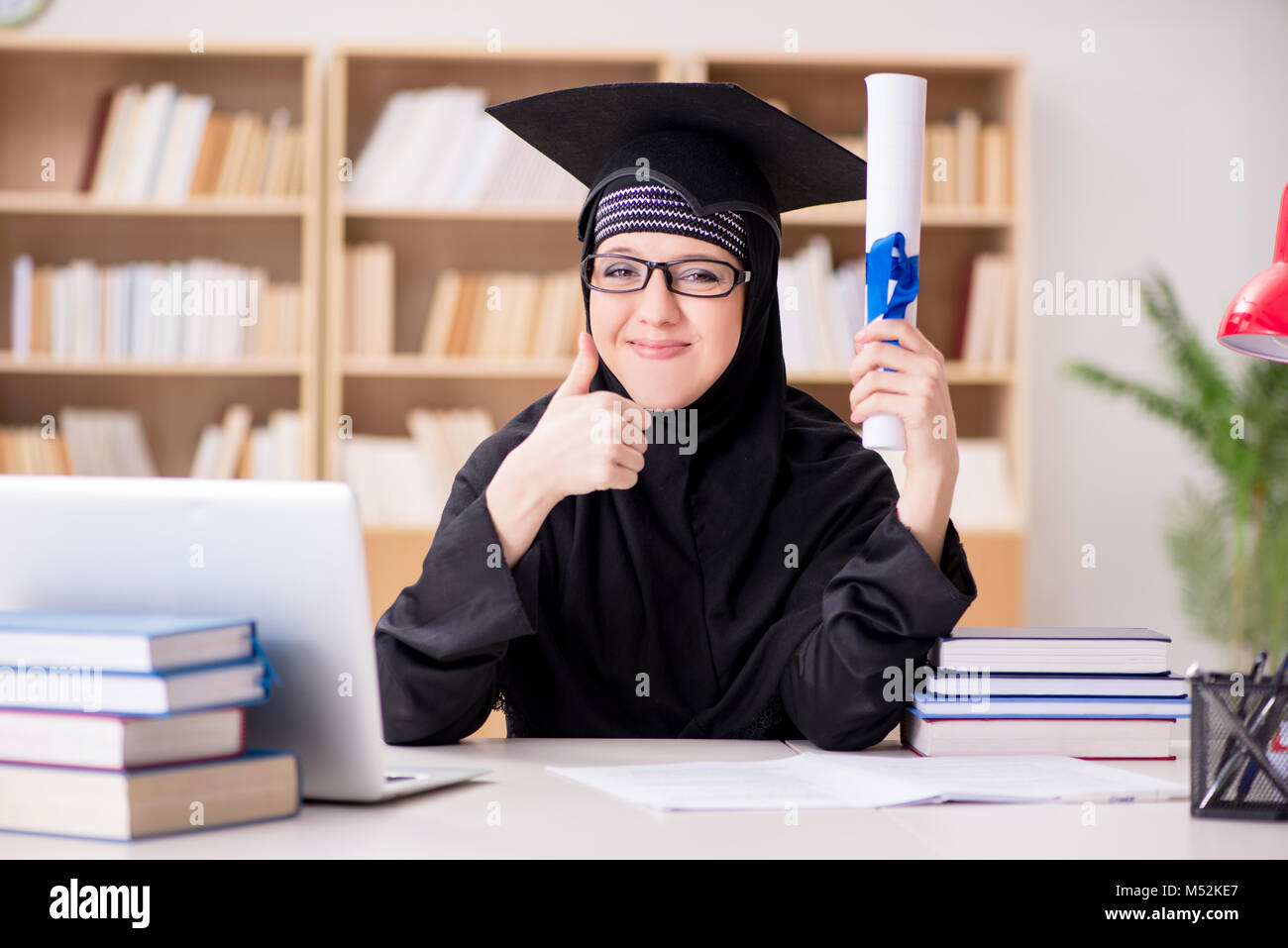 Muslim girl in hijab studying preparing for exams Stock Photo - Alamy