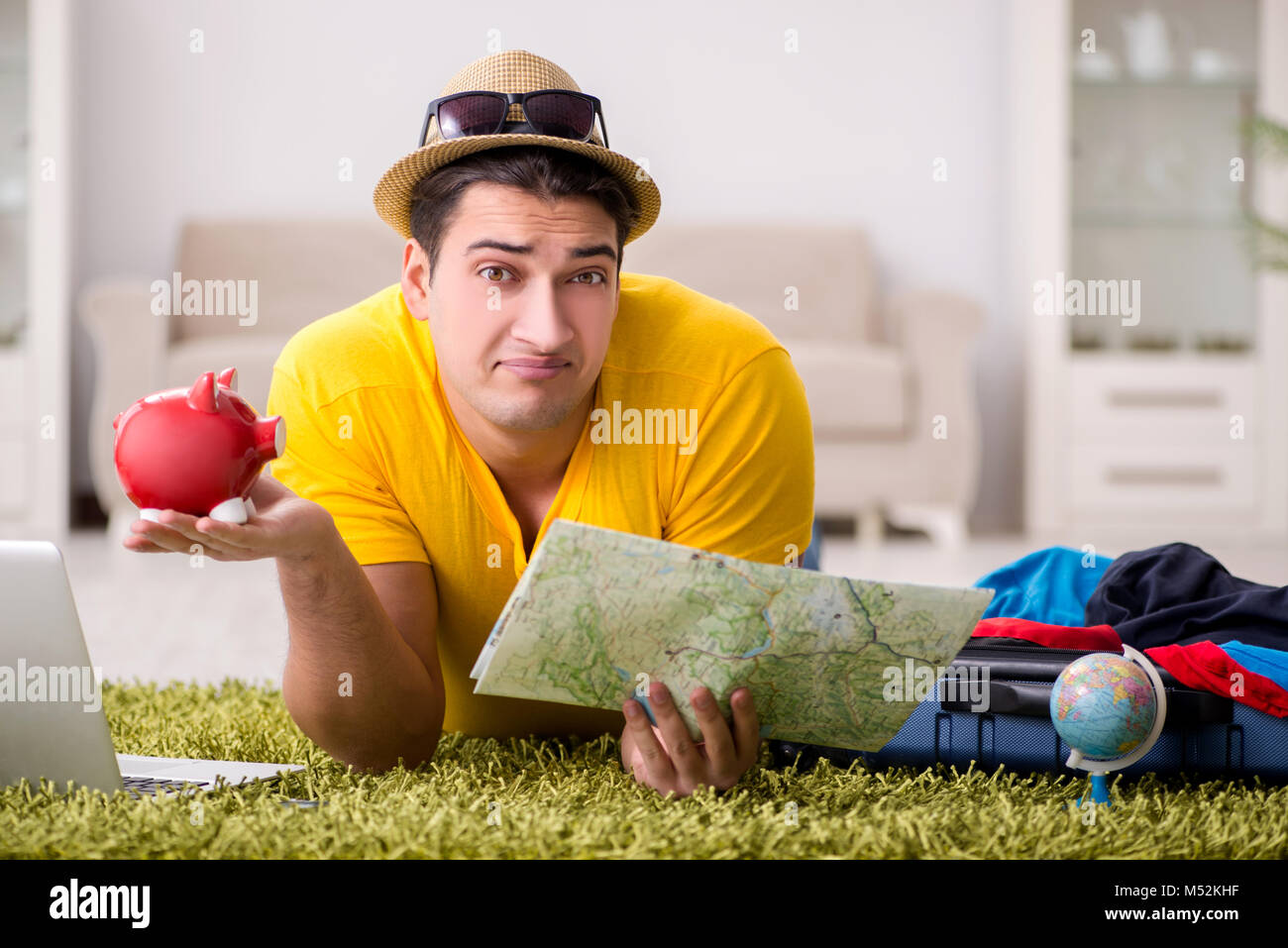 Man planning his vacation trip with map Stock Photo - Alamy