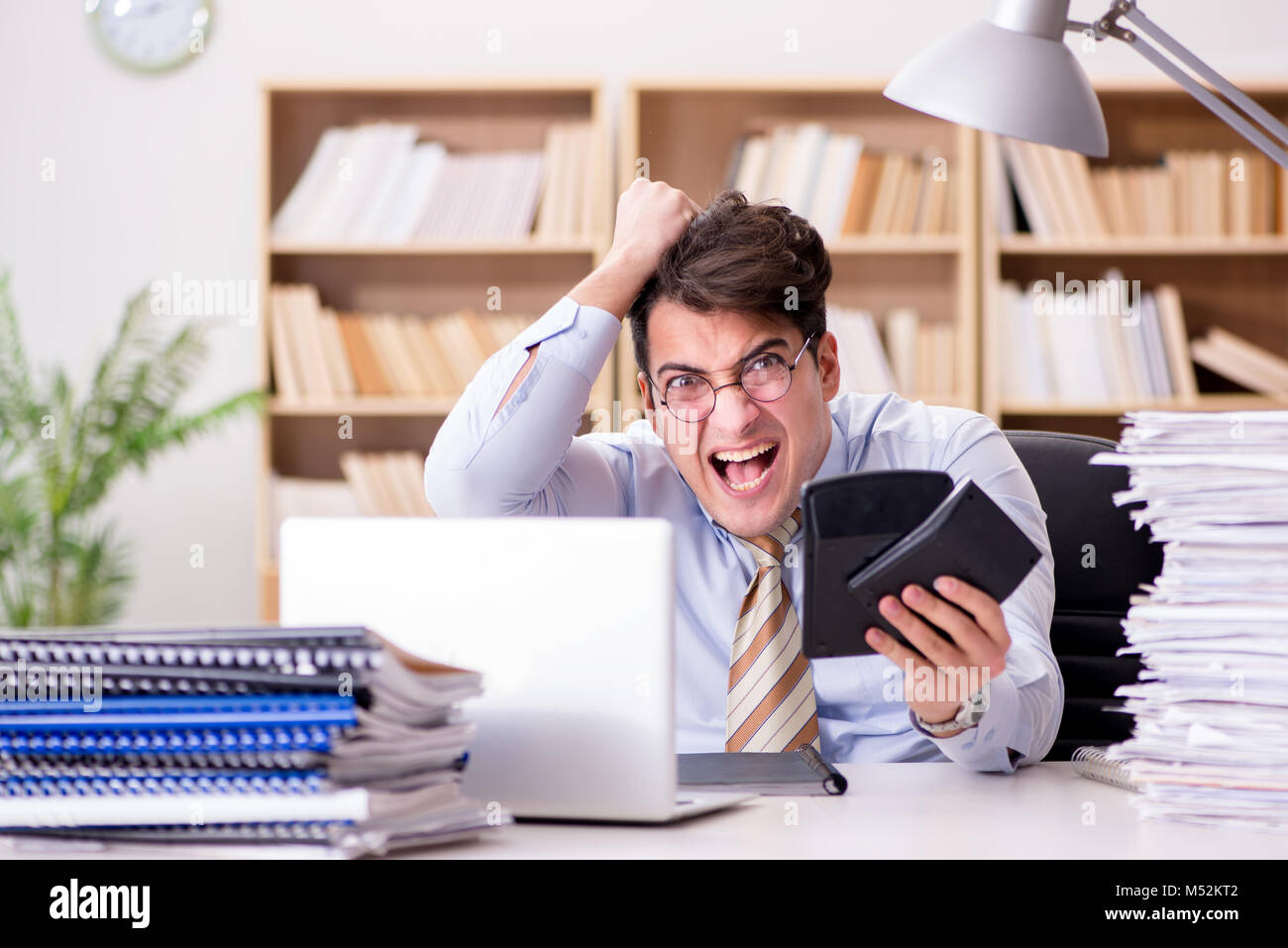Funny accountant bookkeeper working in the office Stock Photo - Alamy