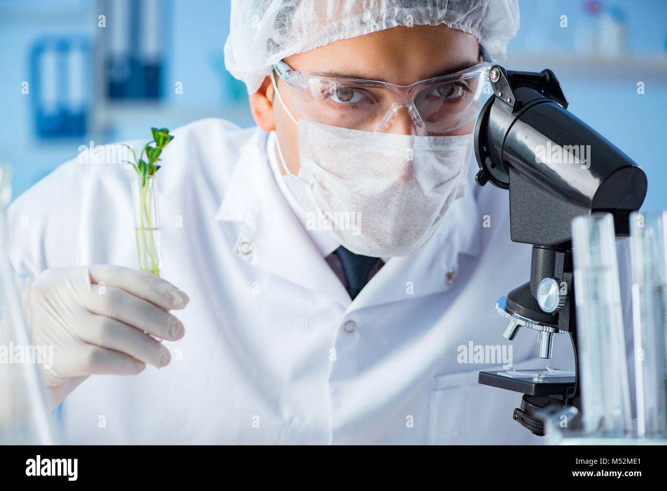 Biotechnology concept with scientist in lab Stock Photo - Alamy