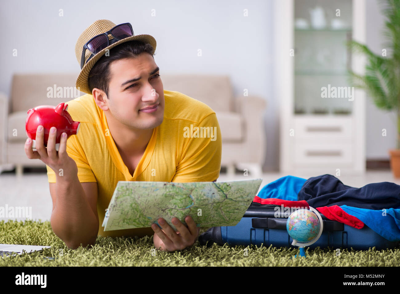 Man planning his vacation trip with map Stock Photo - Alamy