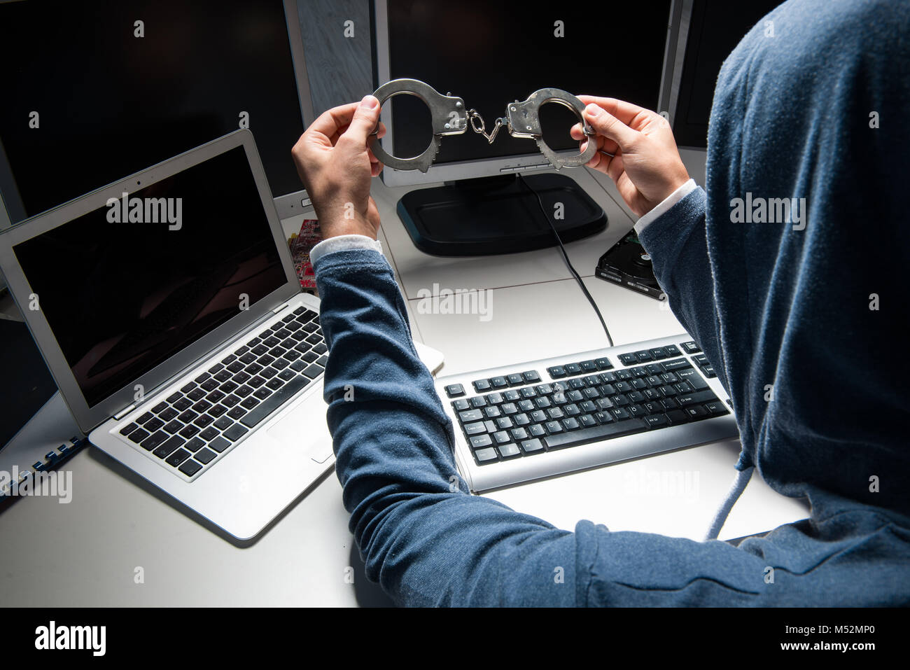Hacker hacking computer at night Stock Photo - Alamy