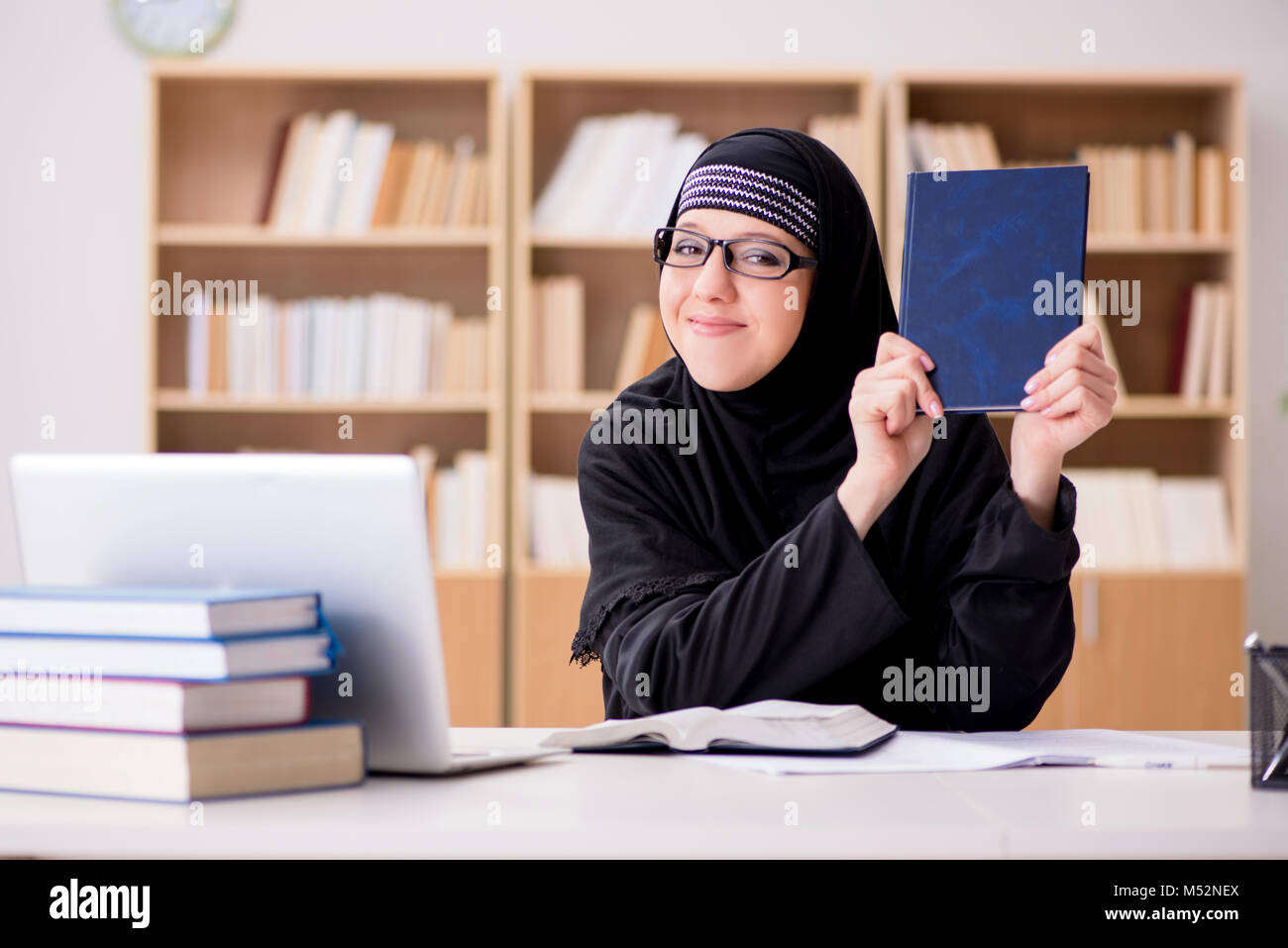Muslim girl in hijab studying preparing for exams Stock Photo - Alamy