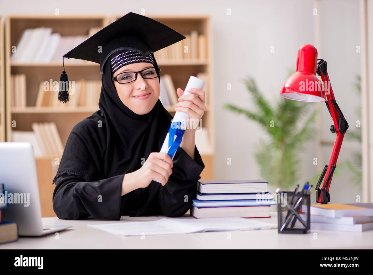 Muslim girl in hijab studying preparing for exams Stock Photo - Alamy