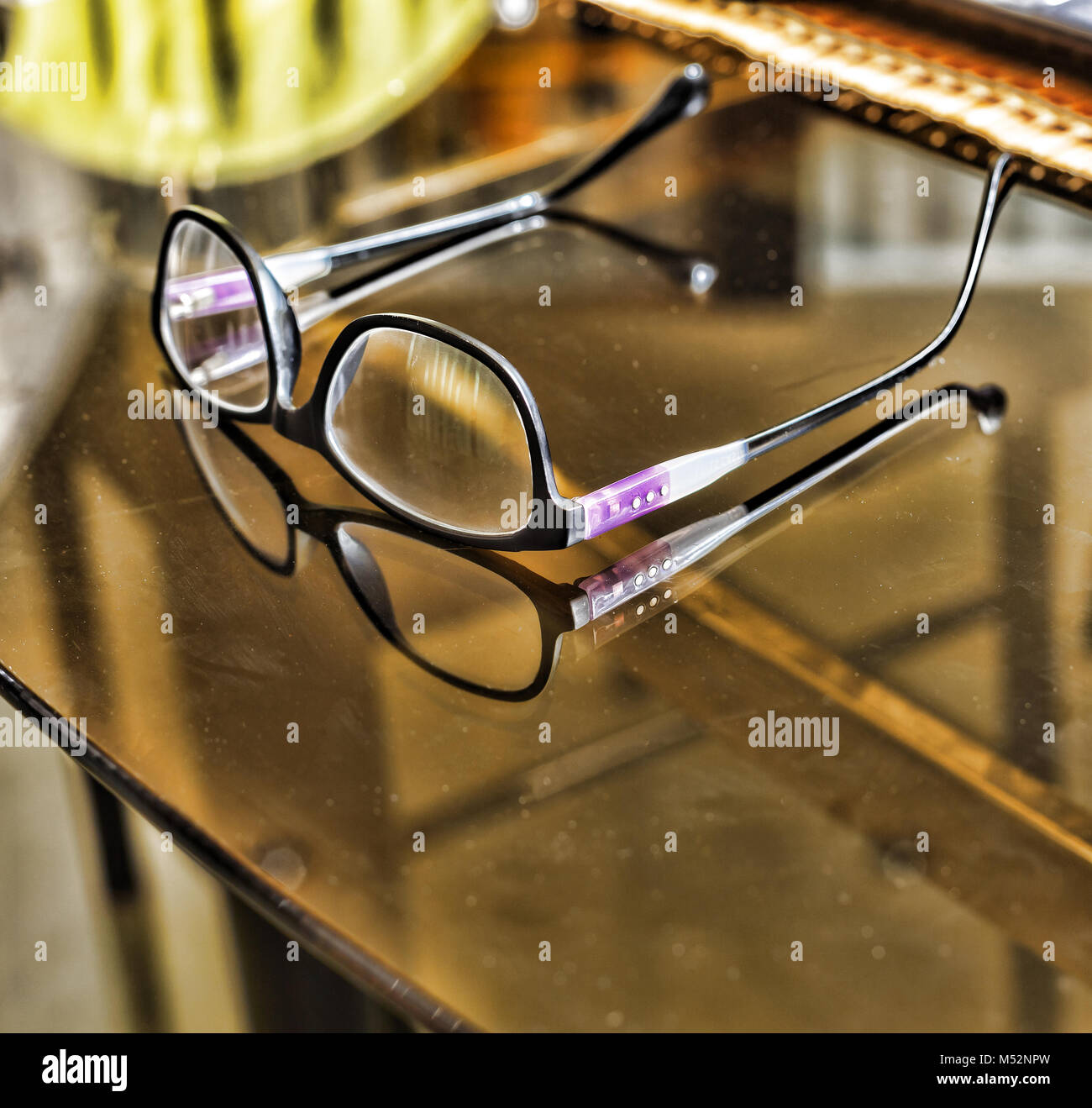 Glasses on a desk in the office Stock Photo - Alamy