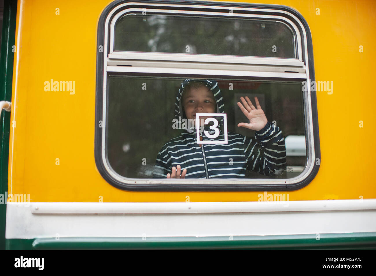 Adorable boy on a train Stock Photo - Alamy