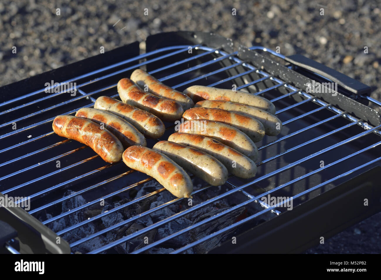 Bratwurst on a grill Stock Photo - Alamy