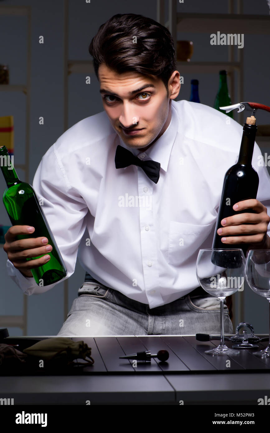Professional sommelier tasting wine in restaurant Stock Photo - Alamy
