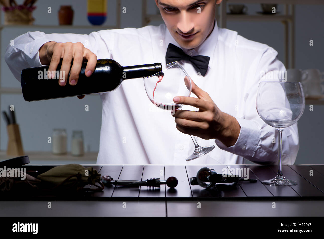 Professional sommelier tasting wine in restaurant Stock Photo - Alamy