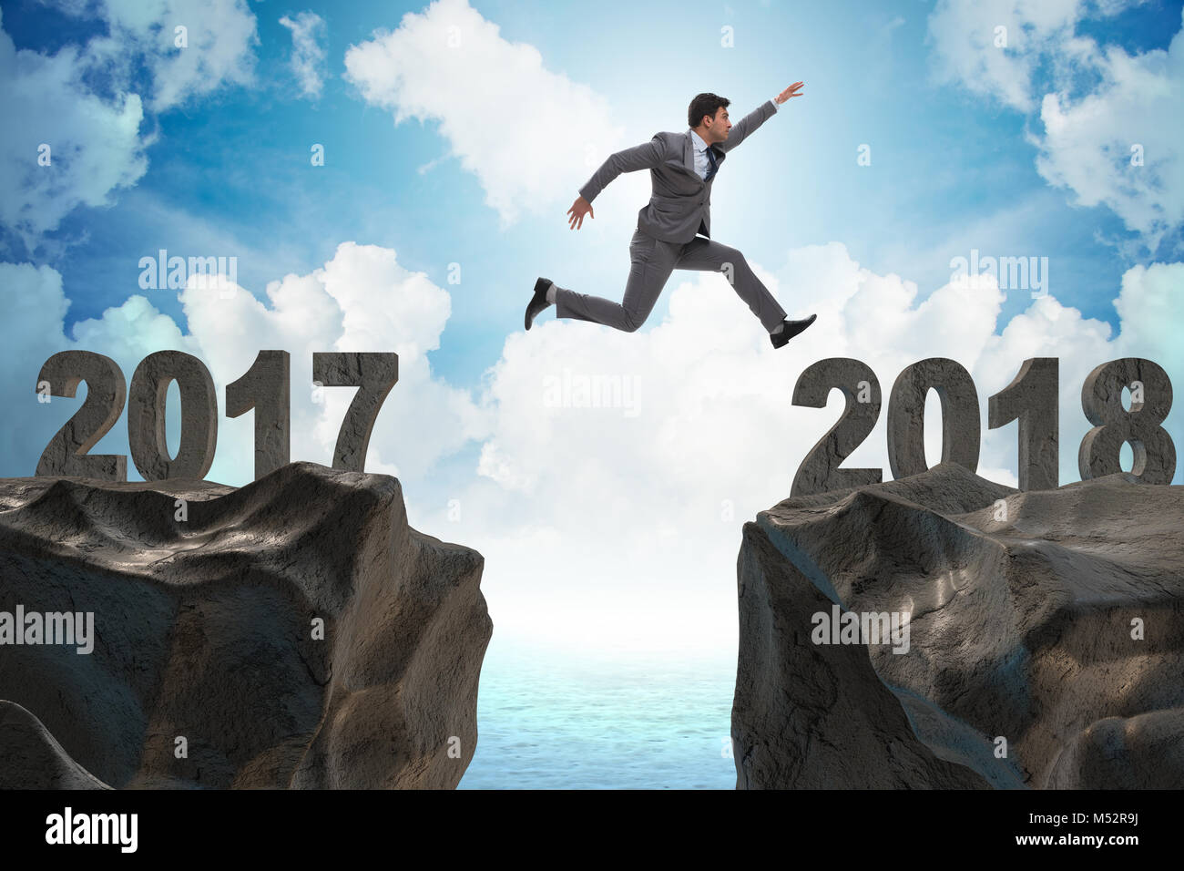 The businessman looking forward to 2018 from 2017 Stock Photo - Alamy
