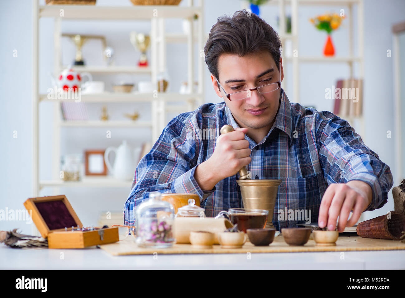 The professional tea expert trying new brews Stock Photo - Alamy