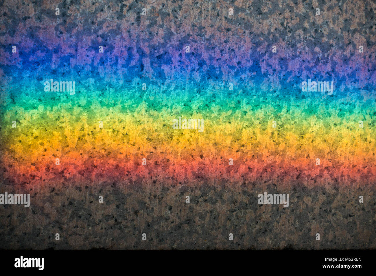 Colorful rainbow reflection on a stone backgroud Stock Photo - Alamy