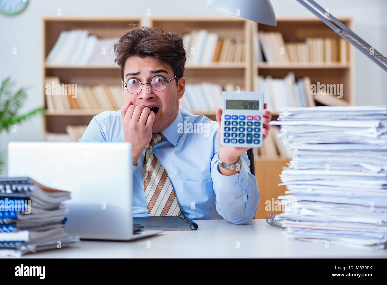 Funny accountant bookkeeper working in the office Stock Photo - Alamy