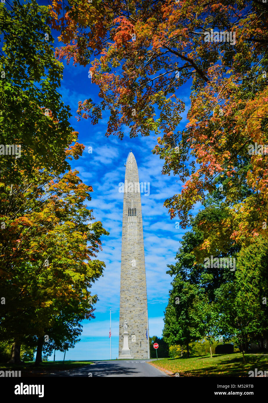 Bennington Battle Monument framed by colorful fall foliage in ...