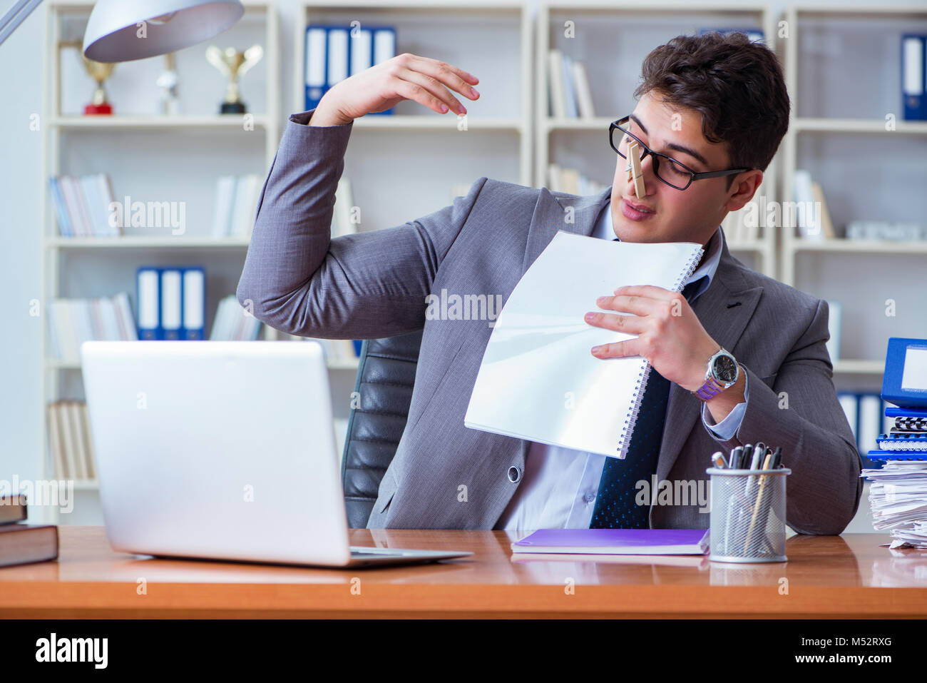Businessman sweating excessively smelling bad in office at workp Stock ...