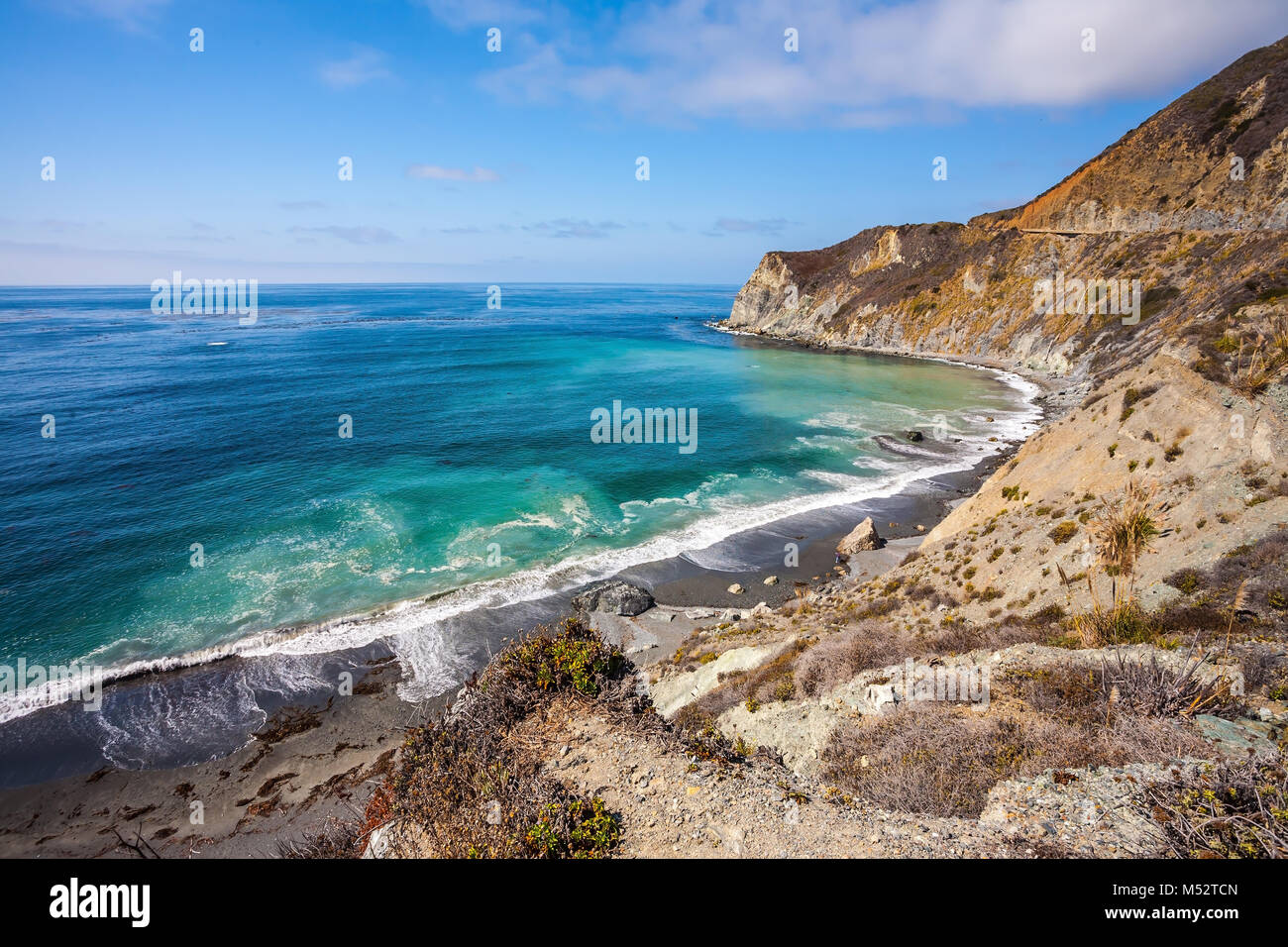 The ocean bay with emerald water Stock Photo - Alamy