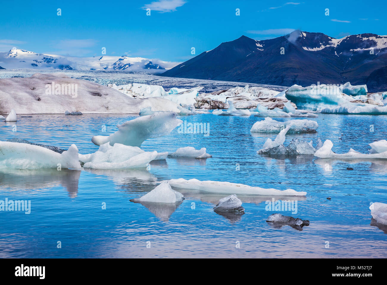 Magnificent morning in ocean gulf with floating ice Stock Photo - Alamy