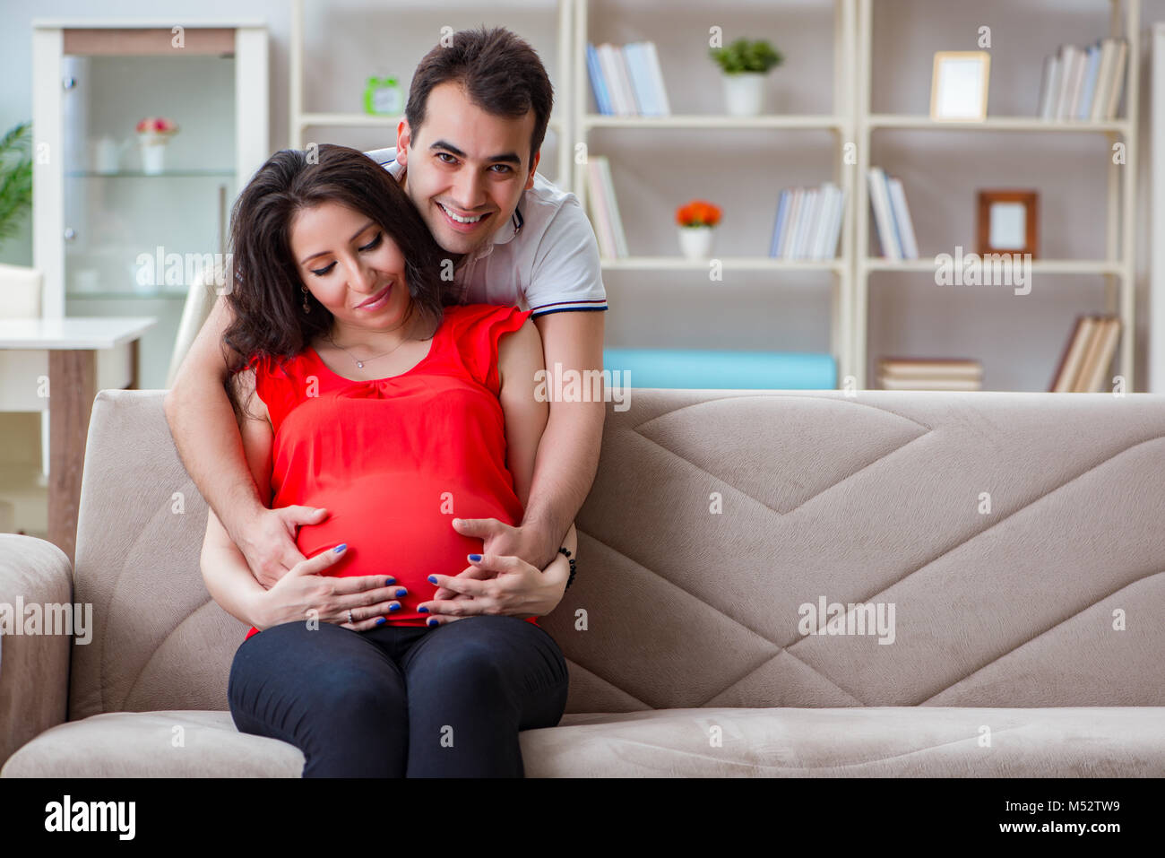 Young couple family expecting a baby Stock Photo - Alamy