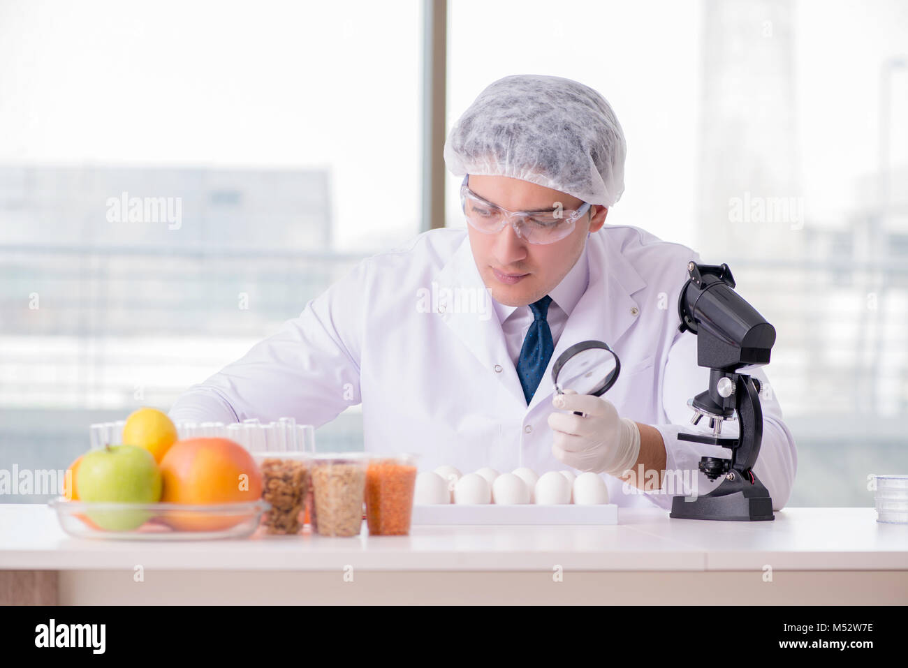Nutrition expert testing food products in lab Stock Photo - Alamy