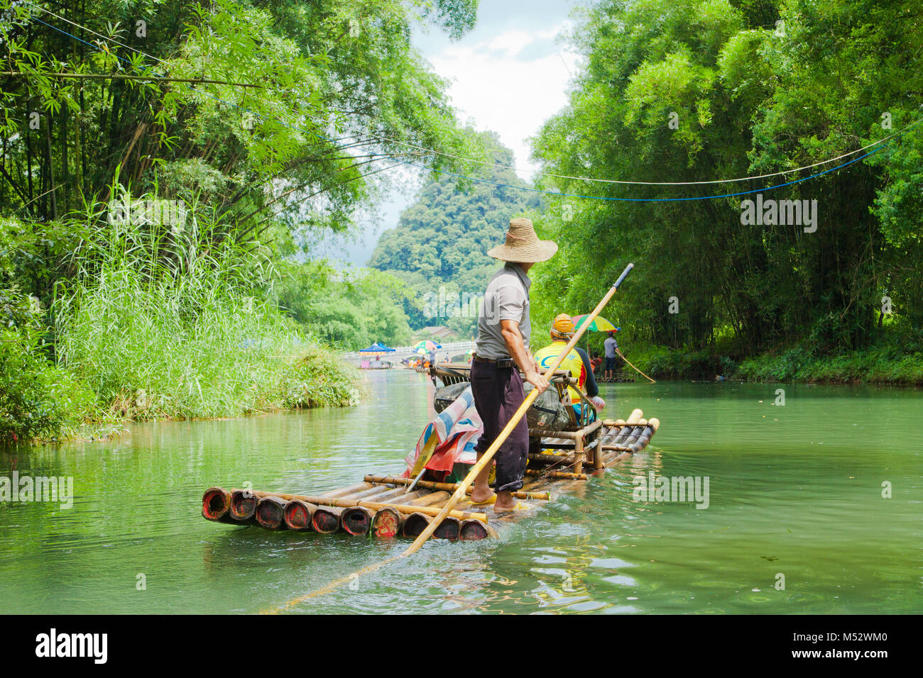 yulong river banboo rafting Stock Photo - Alamy