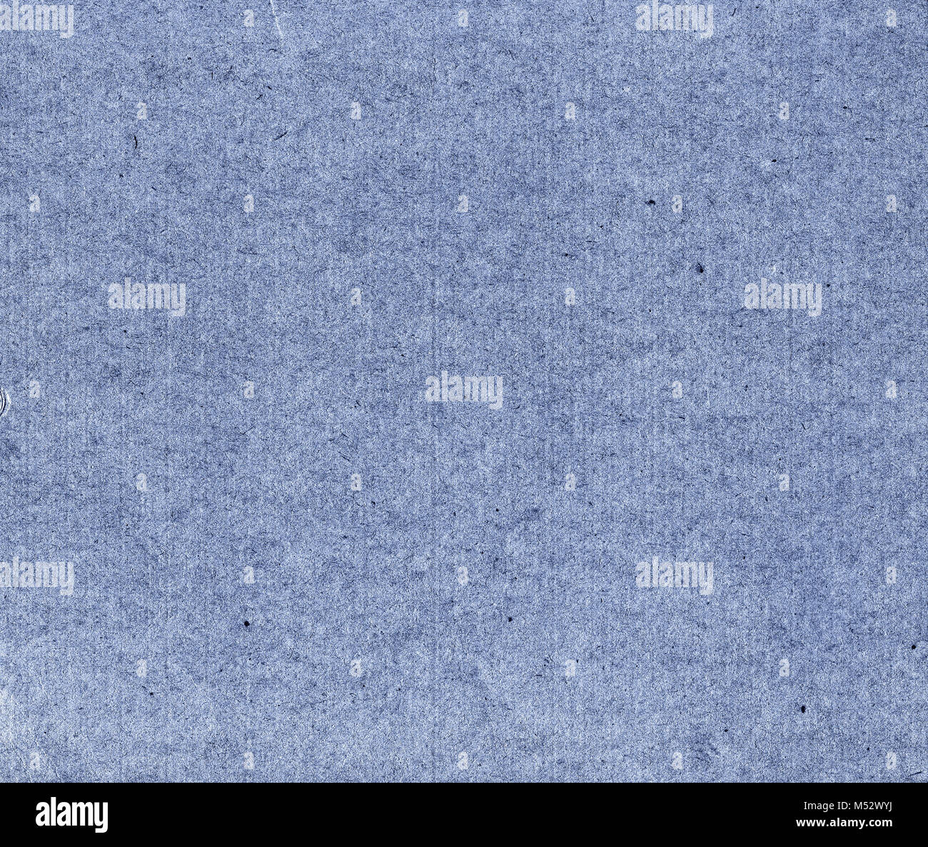 Grainy blue paper Stock Photo - Alamy