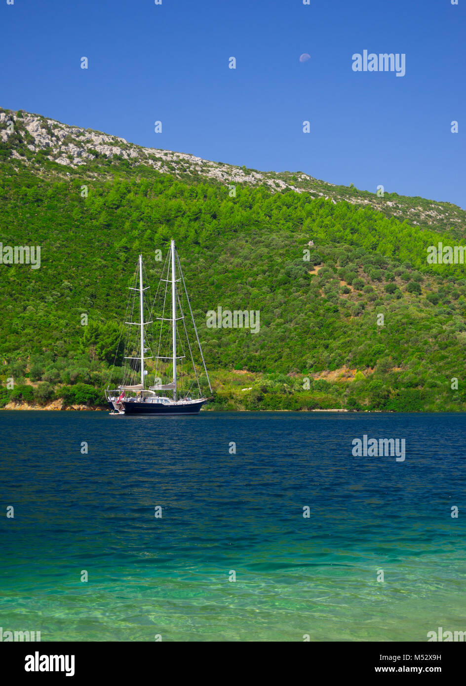Sailing ship in the blue sea Stock Photo - Alamy