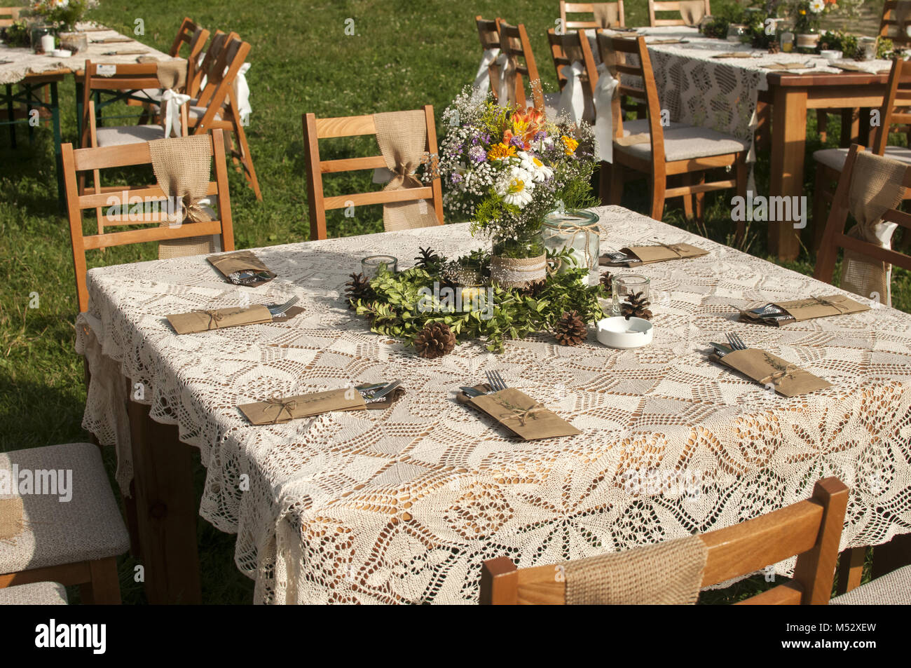 Stacked tables for guests for wedding Stock Photo - Alamy