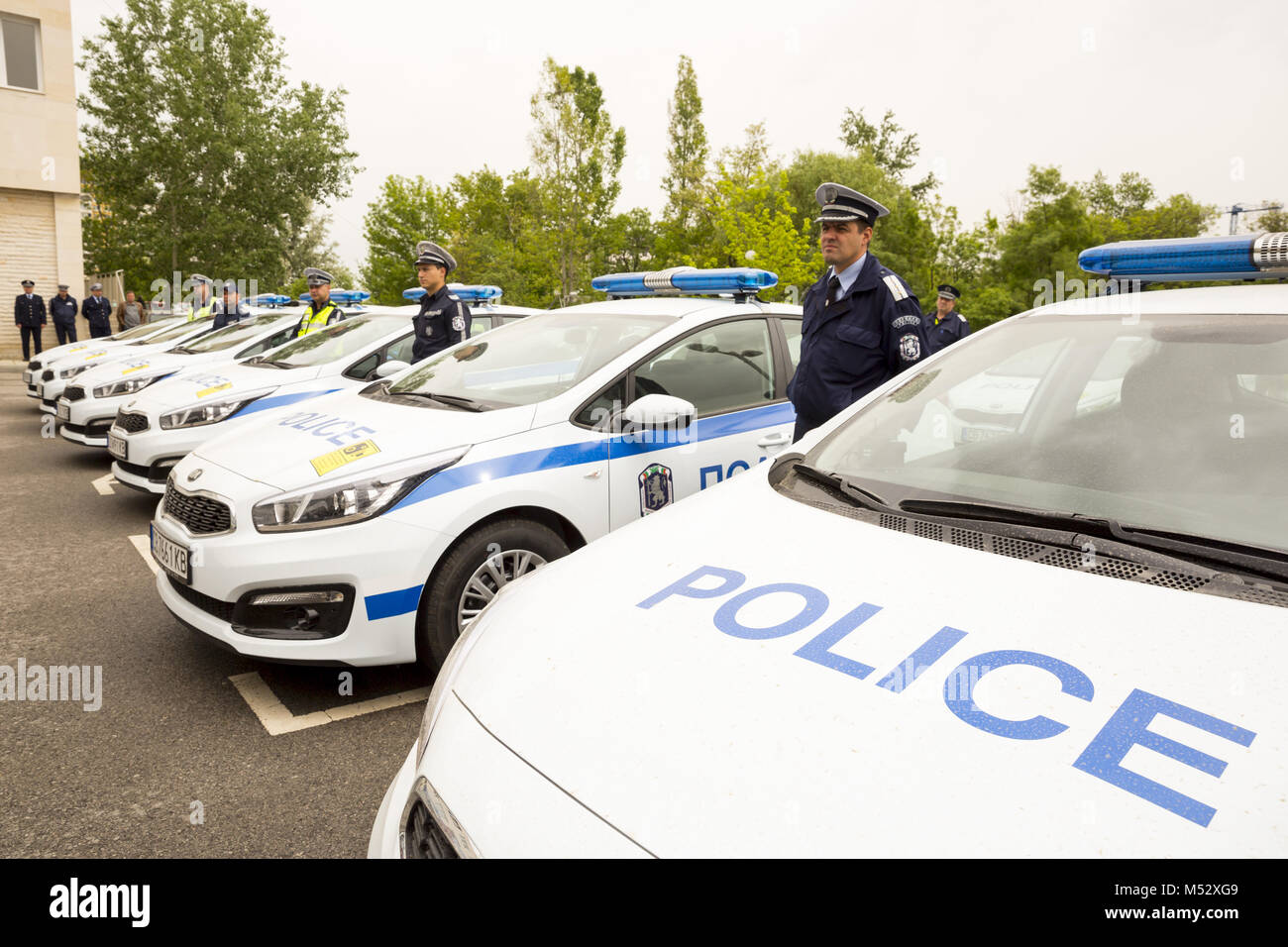 Police officers cars Stock Photo - Alamy