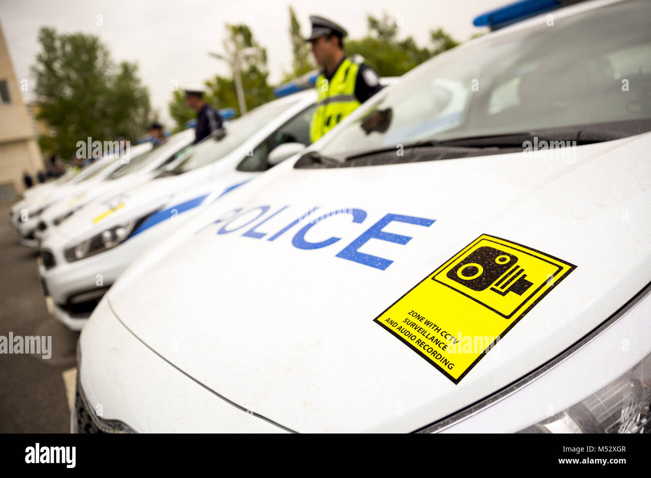 Police officers cars Stock Photo - Alamy