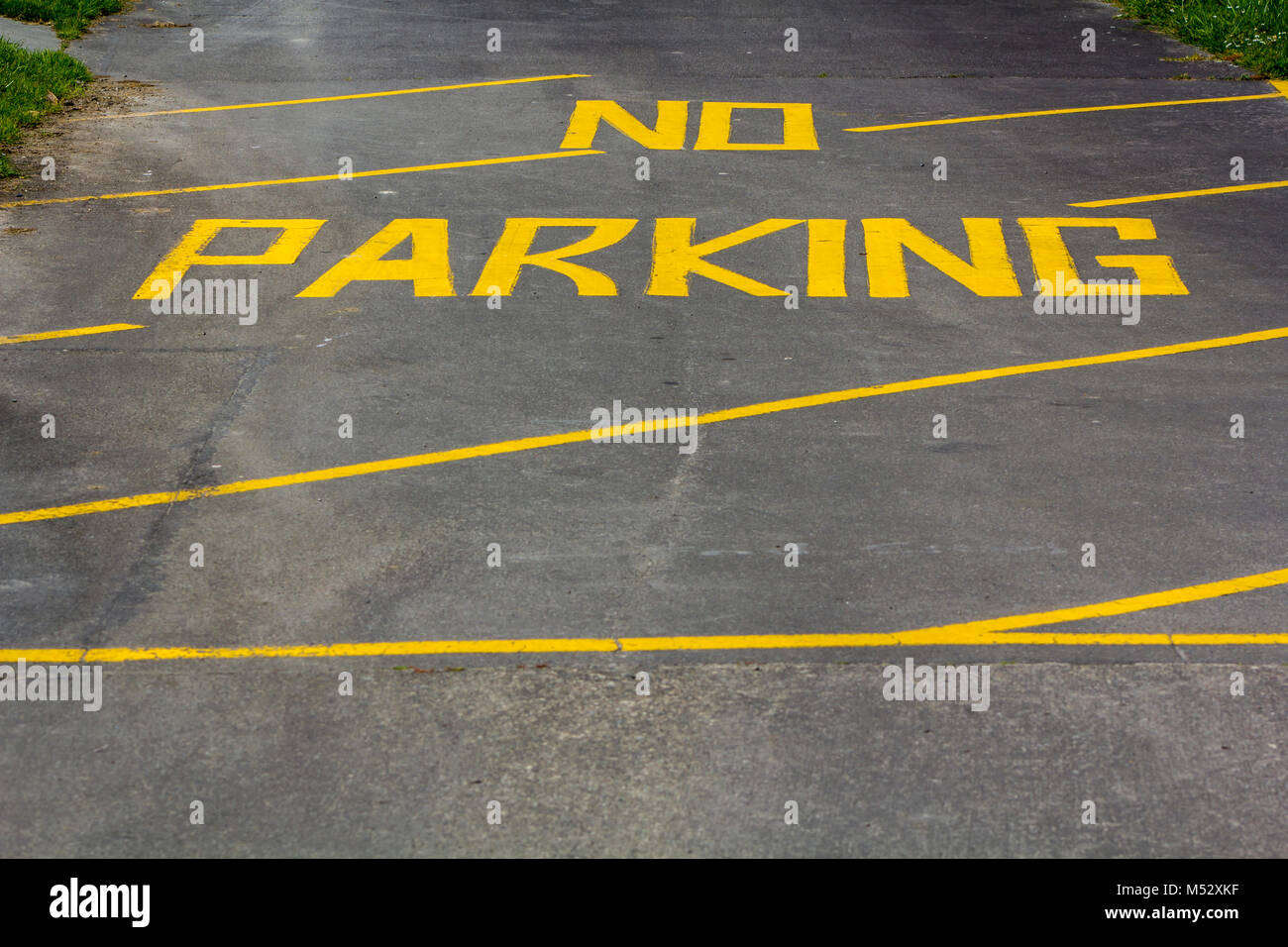 No Parking sign on road Stock Photo - Alamy