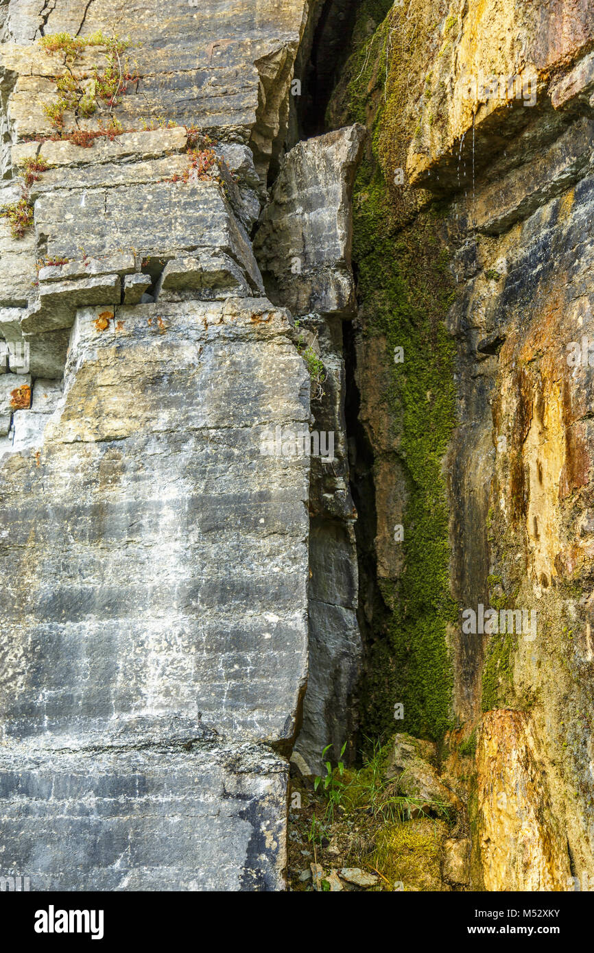 Crevice in a rock and dripping water Stock Photo - Alamy