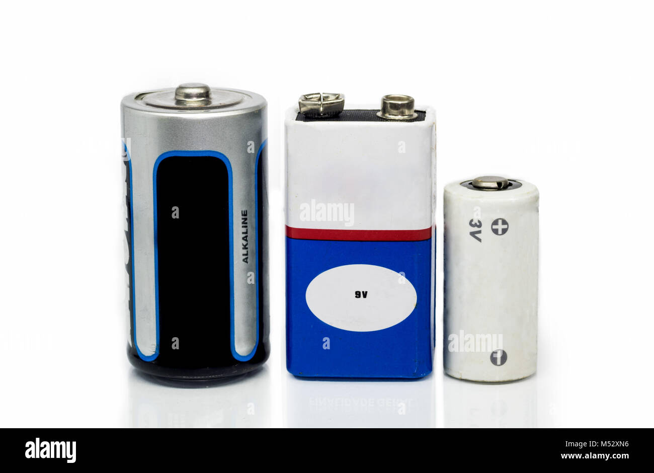 Alkaline batteries, 9v and 3v batteries, isolated on a white background ...