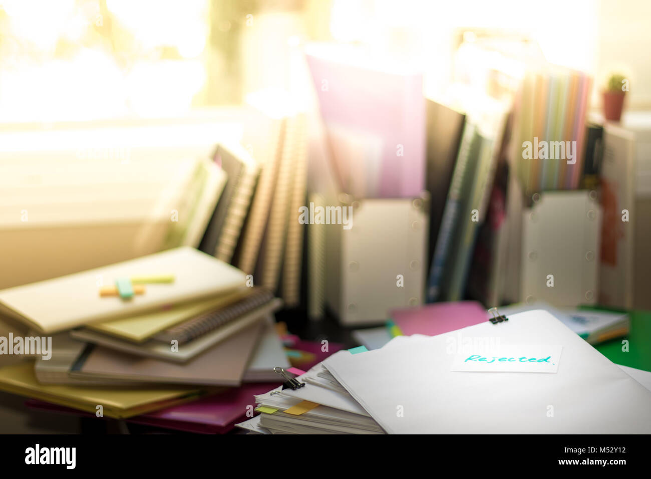 Rejected; Stack of Documents. Working or Studying at messy desk Stock ...