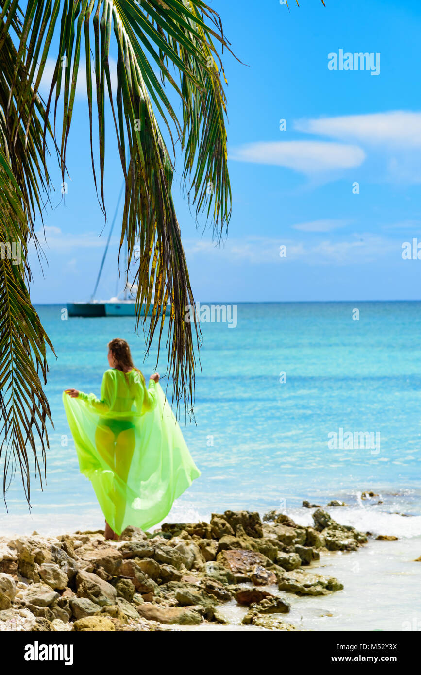 girl poreo sea palm tree Stock Photo - Alamy