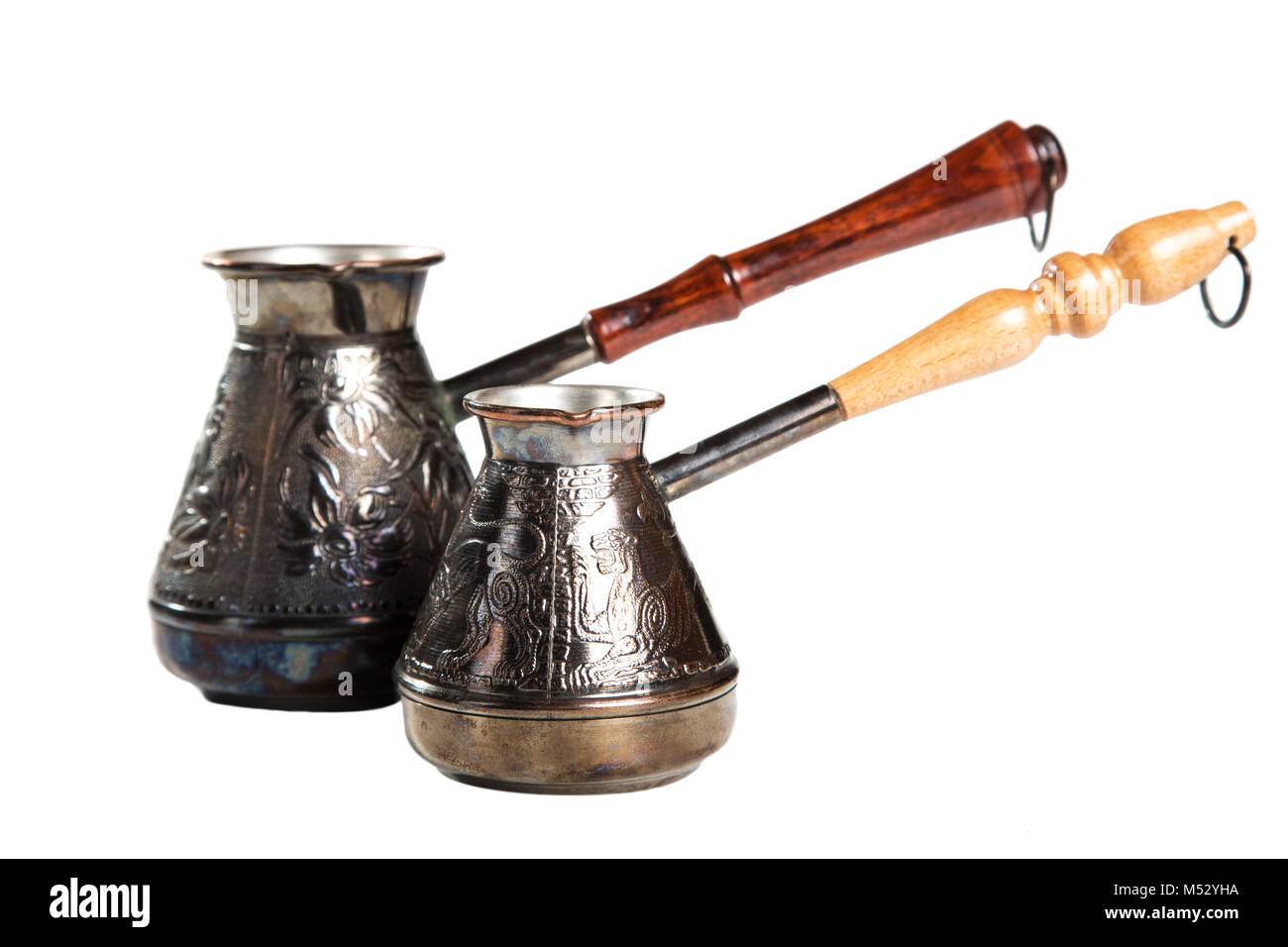 Two copper coffee maker isolated on white background Stock Photo - Alamy