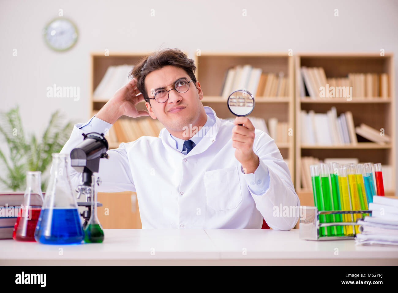 Mad crazy scientist doctor doing experiments in a laboratory Stock ...