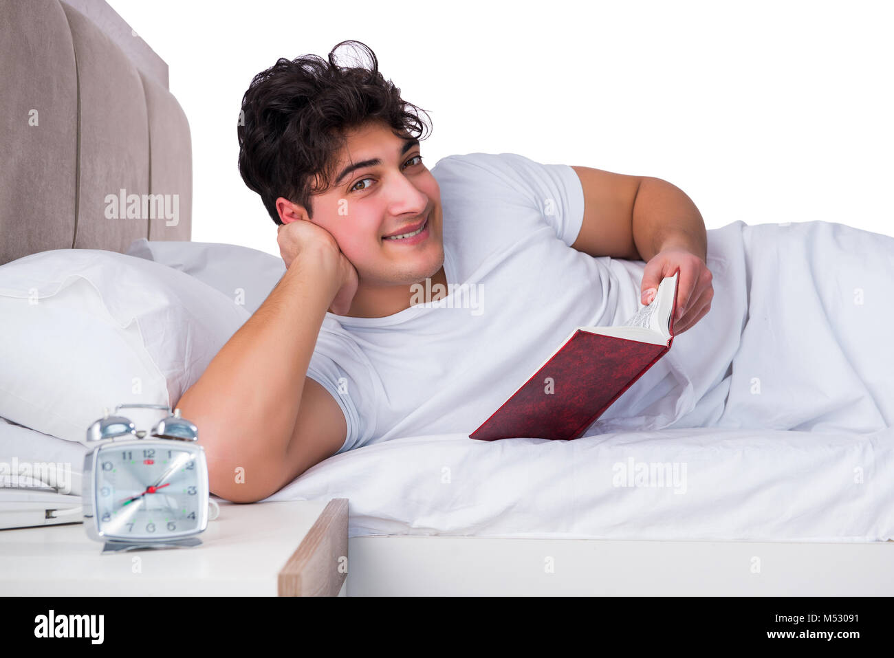 Man in bed suffering from insomnia Stock Photo - Alamy