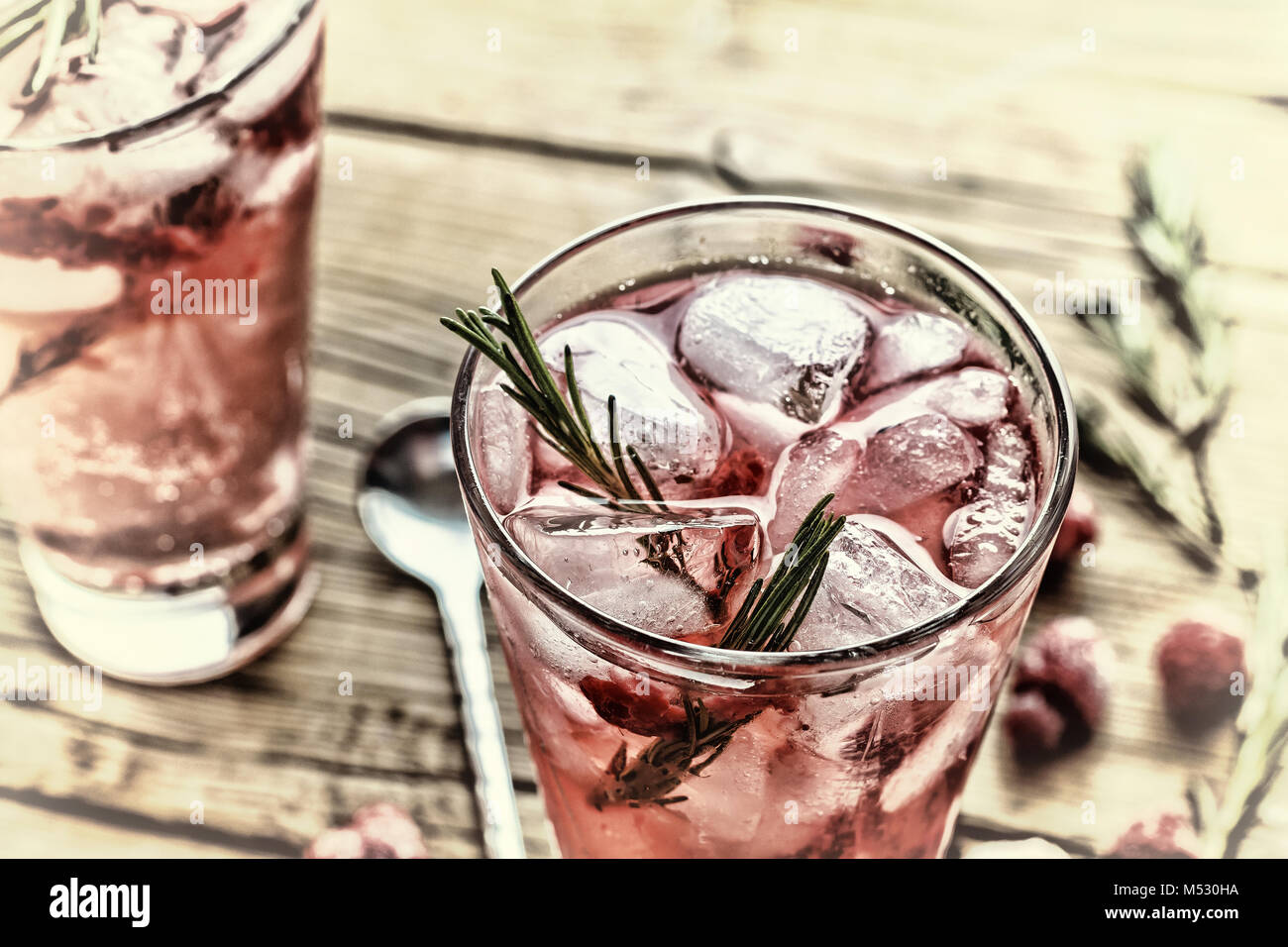 Fruity cocktail drink decorated with frozen raspberry Stock Photo - Alamy