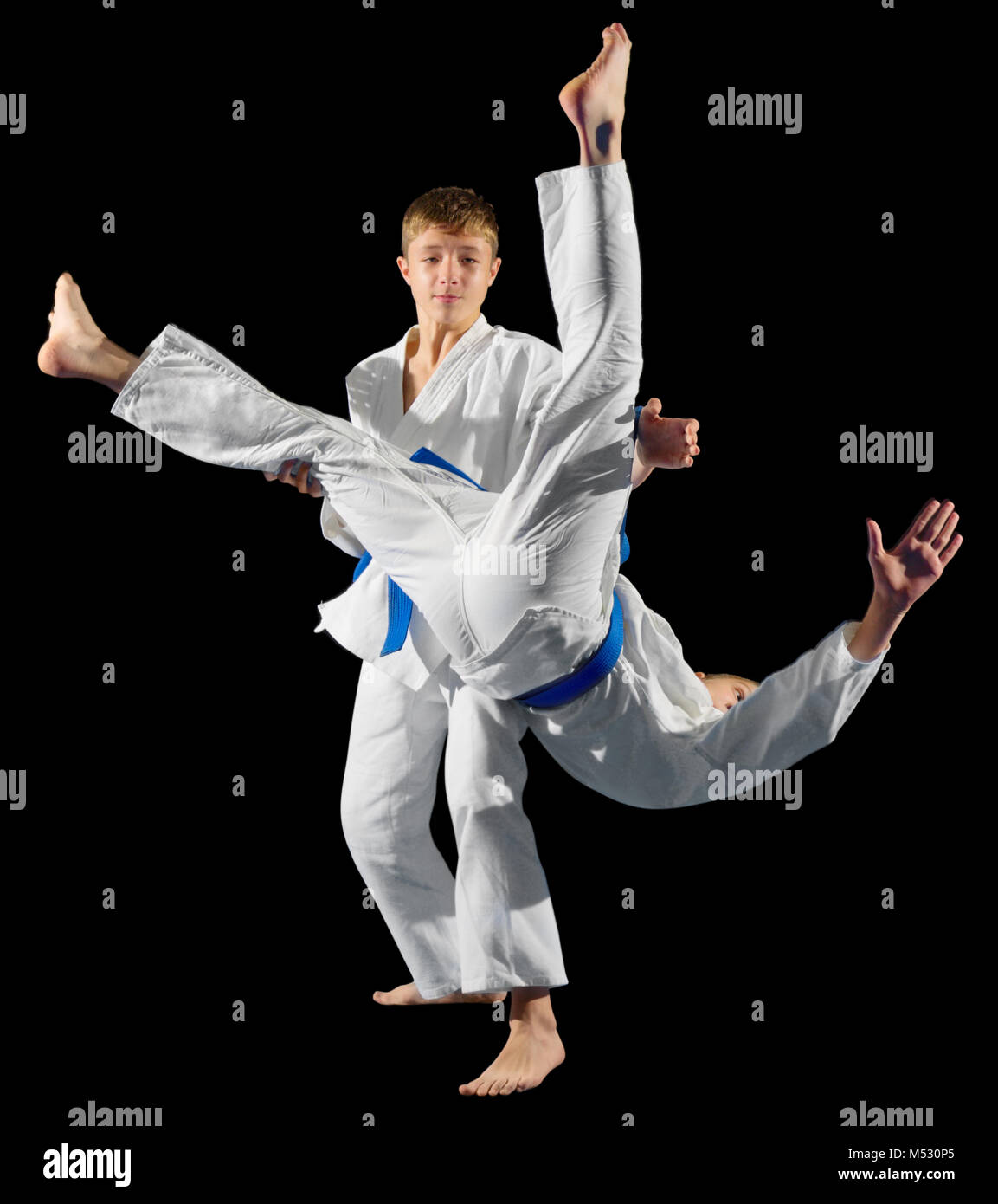 Little boys martial arts fighters isolated Stock Photo - Alamy