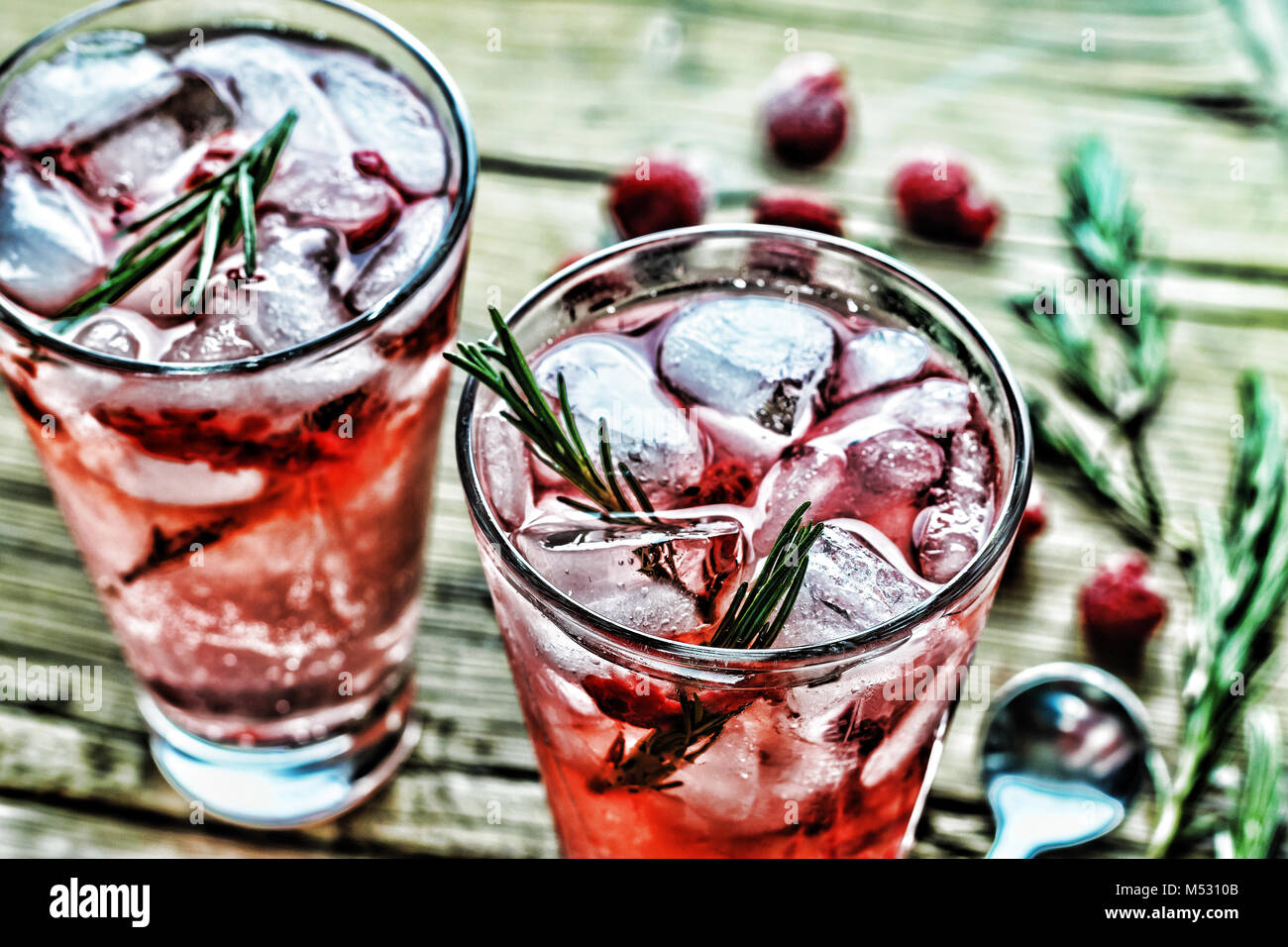 Fruity cocktail drink decorated with frozen raspberry Stock Photo - Alamy
