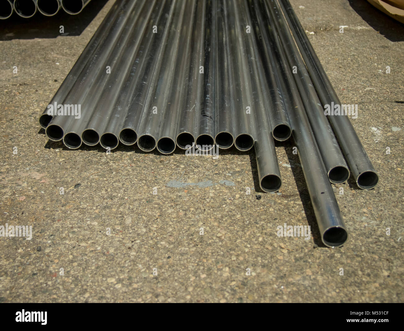 Stack of Many Pipes at the Construction Site Stock Photo - Alamy